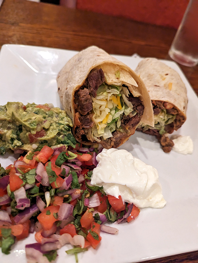 Behold the burrito in its natural habitat&mdash;surrounded by fresh pico de gallo, guacamole, and sour cream like a protein-packed celebrity with its entourage.