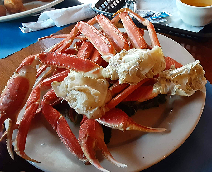 Snow crab legs so impressive they deserve their own zip code. Nature's perfect design: delicious meat protected by a shell that requires just enough effort.
