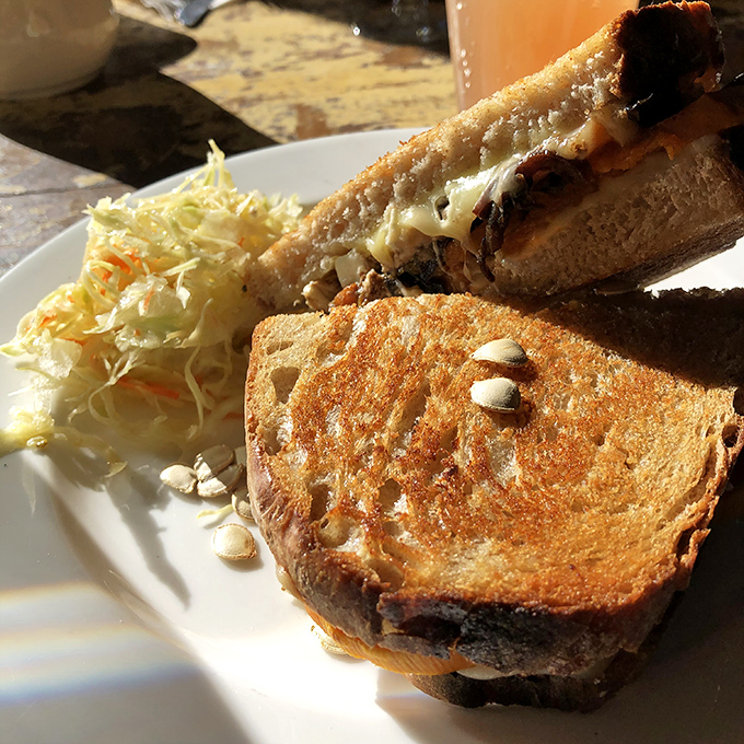 This isn't just toast; it's a sourdough masterpiece with seeds that add the perfect crunch factor to your sandwich experience.