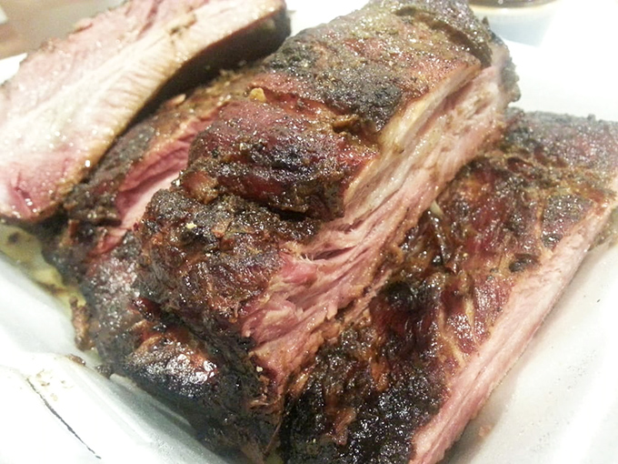 These spare ribs have the kind of bark that makes tree bark jealous. The perfect pink smoke ring is nature's way of saying "you're welcome."