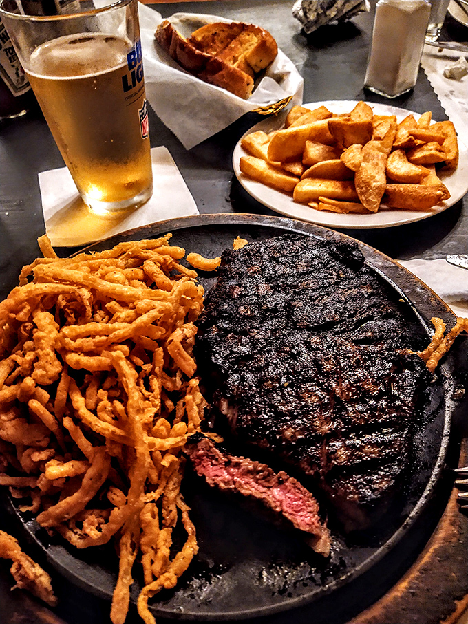 The perfect char marks tell you everything you need to know. This steak has been introduced to heat by someone who respects beef.
