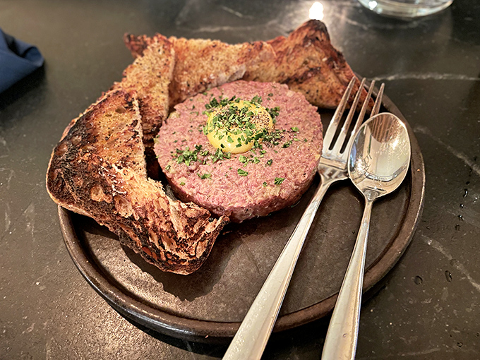 Steak tartare that would make Hemingway weep with joy. Hand-chopped beef with classic accompaniments and that essential touch of decadence.