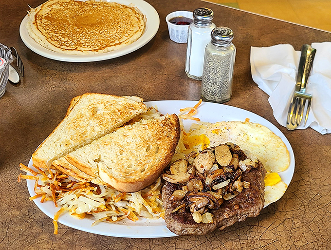 When steak and eggs share a plate, it's like breakfast and lunch had a beautiful baby. Those mushroom-topped beauties make "most important meal" seem like an understatement.