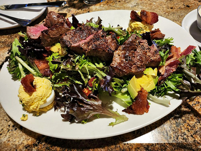 When your salad comes topped with medallions of steak this perfect, you can almost convince yourself you're being virtuous.