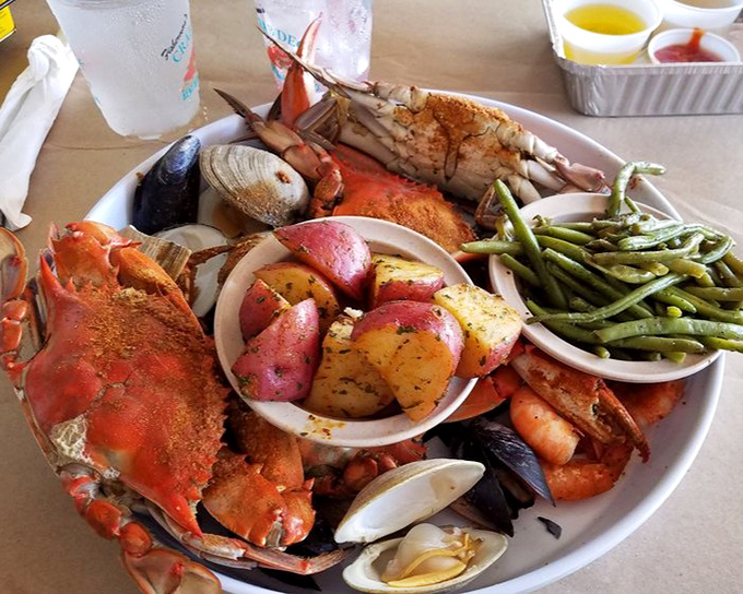 The seafood feast that launches a thousand bibs. When your plate looks like this, conversation stops and serious eating begins.