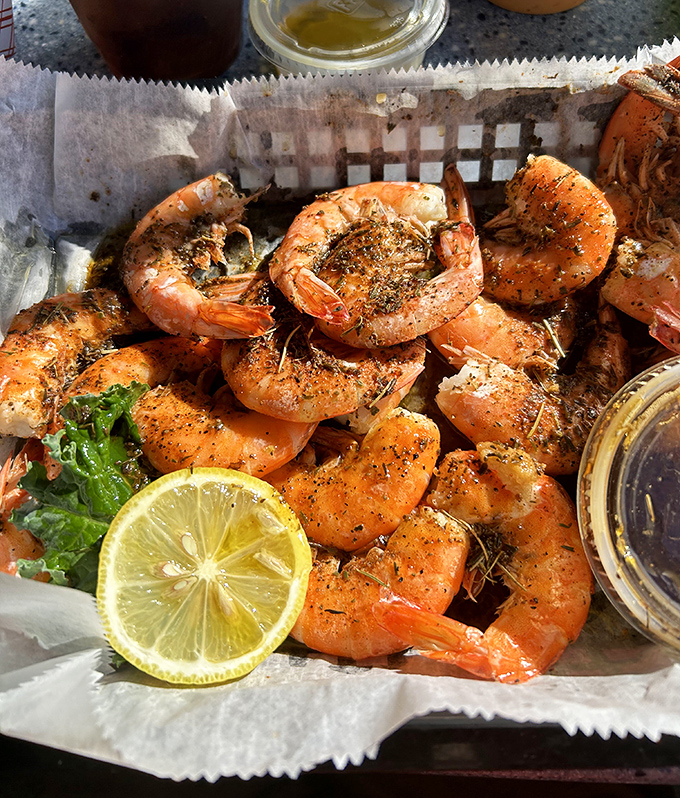 These aren't just shrimp&mdash;they're plump, perfectly seasoned treasures from the deep, waiting for their lemon-squeezing baptism before disappearing faster than your vacation days.