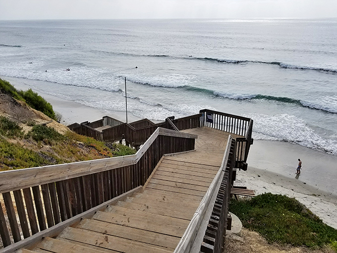 These wooden steps to the beach aren't just a pathway – they're a stairway to heaven for surfers and sunset chasers alike.