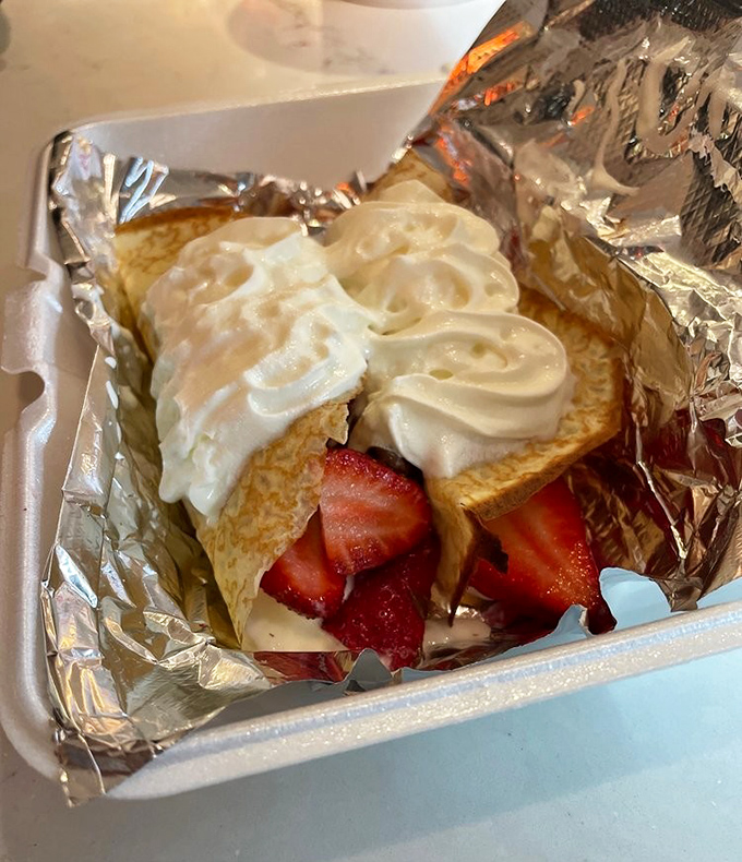 This isn't just a crepe &ndash; it's a strawberry-banana-Nutella miracle wrapped in thin pancake and topped with cloud-like whipped cream.