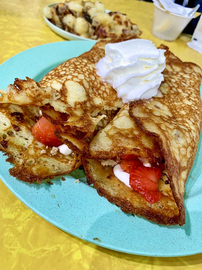 These strawberry hotcakes don't just satisfy hunger&mdash;they create memories. The crispy edges fold over fresh berries like they're giving them a warm hug.