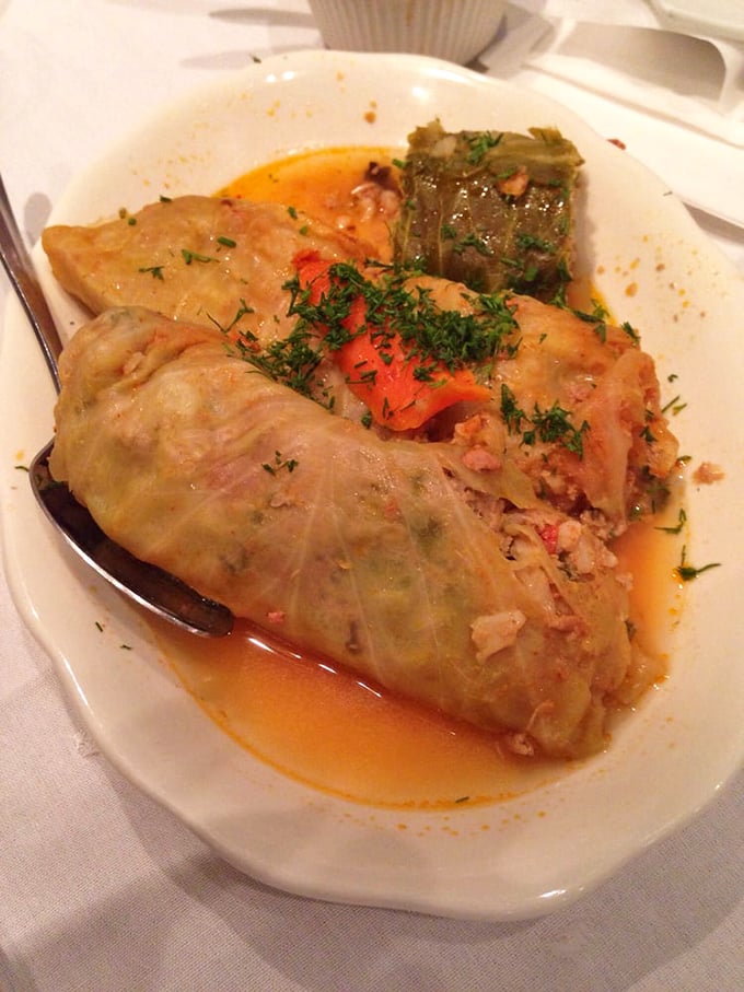 These stuffed cabbage rolls arrive looking like little green presents wrapped by someone who truly understands comfort food.