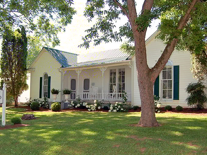 White rocking chairs on a pristine porch surrounded by hydrangeas &ndash; Southern hospitality doesn't get more picture-perfect than the Sutton Homestead.