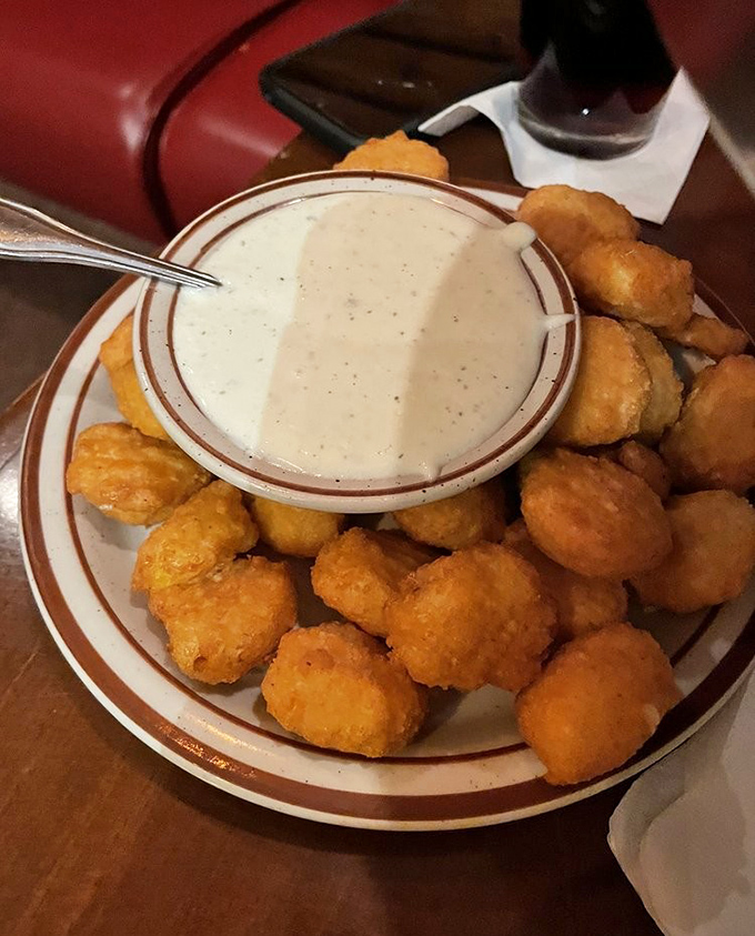 Golden sweet corn nuggets arrive like little bites of summer sunshine, complete with creamy dipping sauce.