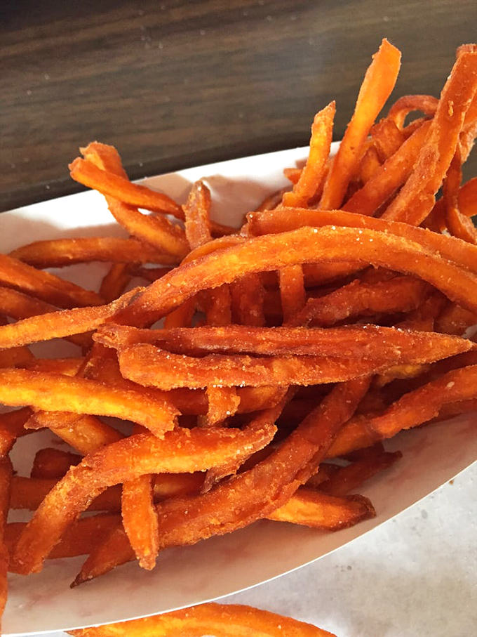 Sweet potato fries that manage to be both crispy and tender&mdash;a culinary magic trick that deserves standing ovation and extra dipping sauce.
