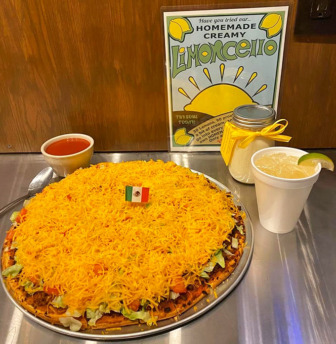 Villa Nova's taco pizza flaunts its Mexican-Italian fusion with shameless pride. That mountain of cheese could solve diplomatic relations between Rome and Mexico City.