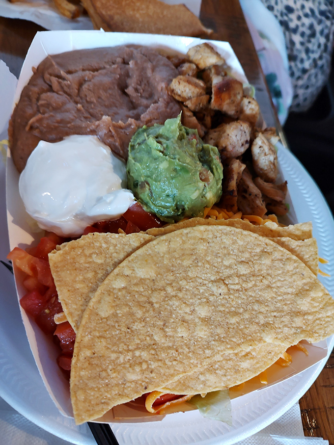The taco salad – where Tex meets Mex in a fiesta bowl that makes you forget you ordered something healthy-adjacent.