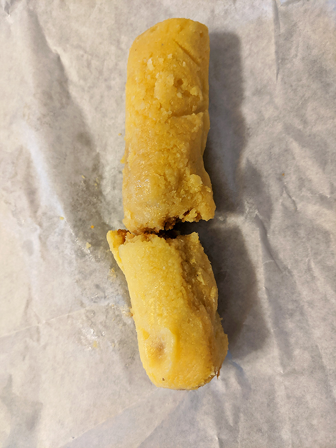 The unsung hero of Gene & Jude's menu: a cornmeal tamale that defies expectations and keeps locals coming back when the tourists aren't looking.