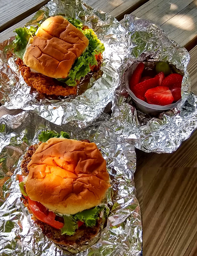 Behold the famous tenderloin sandwich in its natural habitat&mdash;a bun comically overwhelmed by golden-fried pork. The "where's the bread?" phenomenon is pure Indiana poetry.