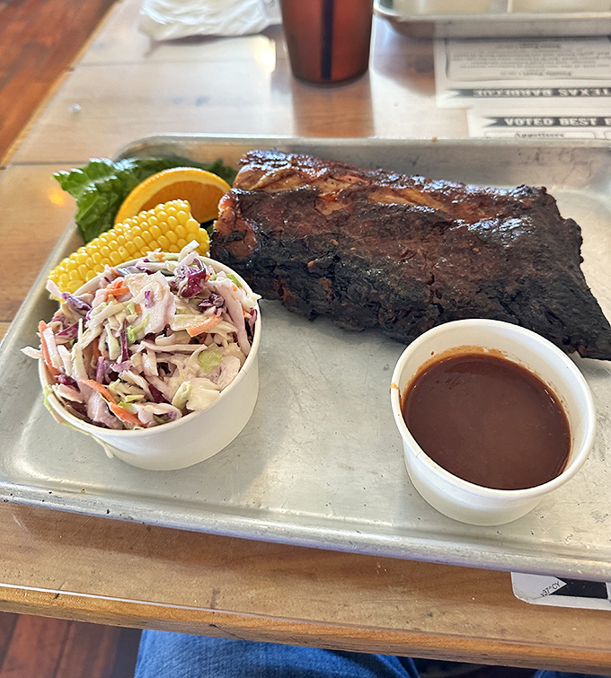 This isn't just a meal; it's a Texas-style manifesto. That bark on the ribs tells stories of patient smoking that no rushed cooking method could ever replicate.