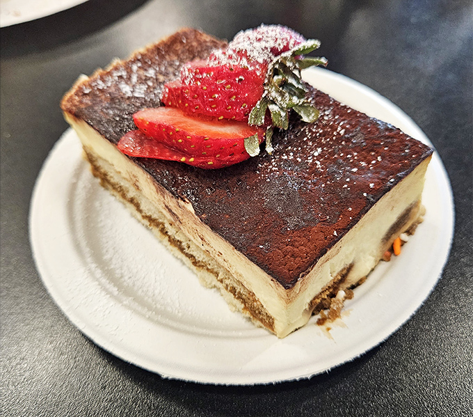 Not just tiramisu, but tiramisu that's dressed for a special occasion with those strawberries standing guard like delicious sentinels.