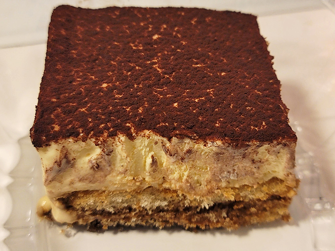 Tiramisu so perfectly layered it could teach geology classes. The cocoa-to-cream ratio here deserves its own mathematical equation.