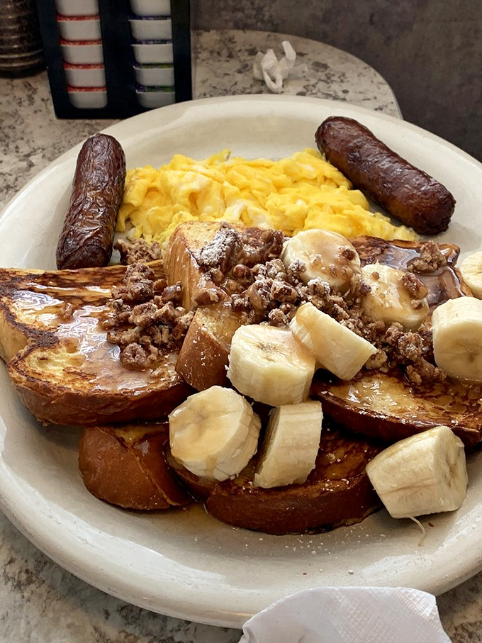 French toast that would make France jealous, paired with eggs and sausage. The breakfast trifecta that dreams are made of.