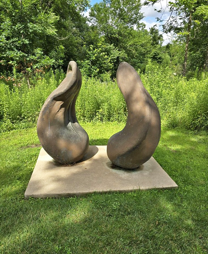 These curved bronze forms seem to be having their own private conversation. What secrets are they sharing? Only the sculptor knows.