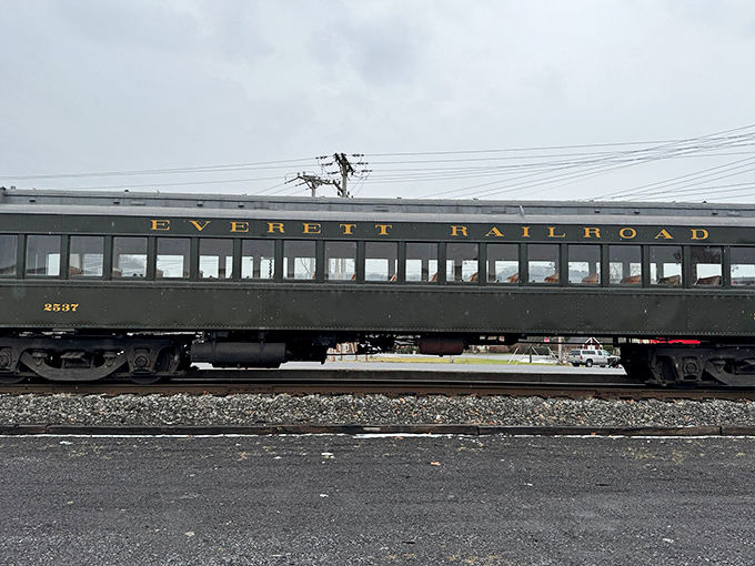 The elegant passenger car bears the Everett Railroad name in gold lettering&mdash;a rolling museum piece that still earns its keep.
