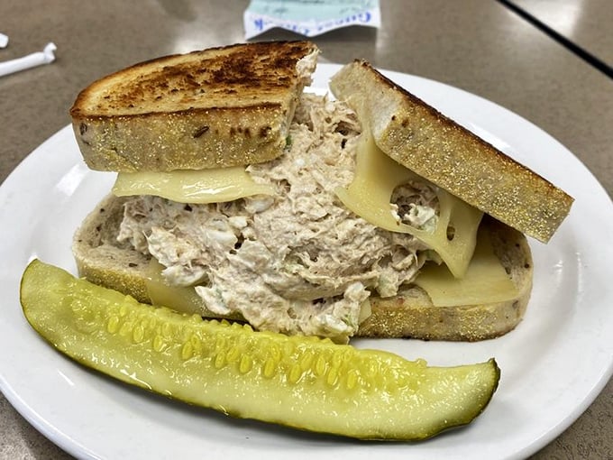 The tuna melt at Slyman's proves that even their "lighter" options require two hands and a strategy session. That pickle isn't garnish&mdash;it's moral support.