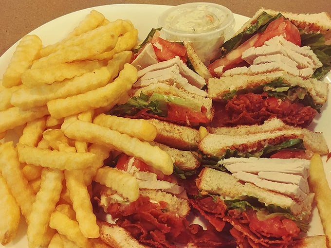 This club sandwich isn't just stacked&mdash;it's architected. A skyscraper of turkey, bacon, and fresh veggies that requires a game plan before the first bite.