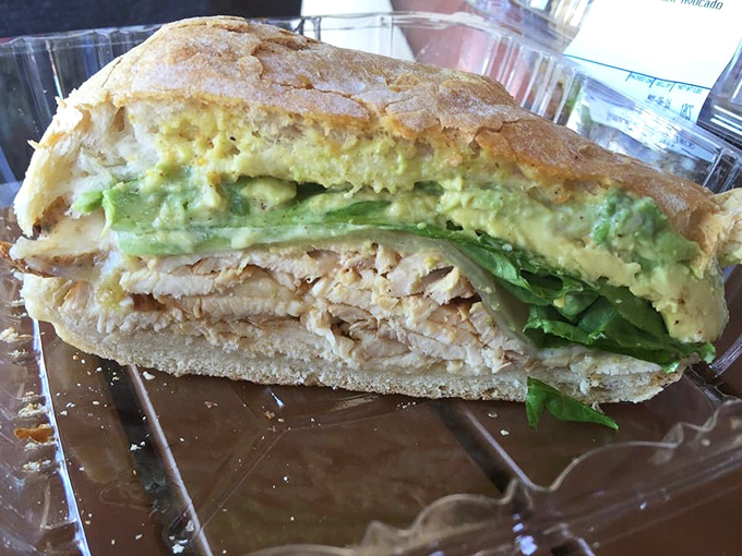 The cross-section reveals the architectural genius of this turkey avocado masterpiece. Like the Sagrada Familia of sandwiches, both beautiful and fulfilling.
