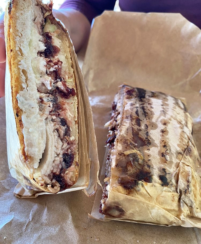 The cross-section tells the story&mdash;perfectly grilled bread giving way to layers of savory goodness that makes you wonder why you'd ever eat anything else.