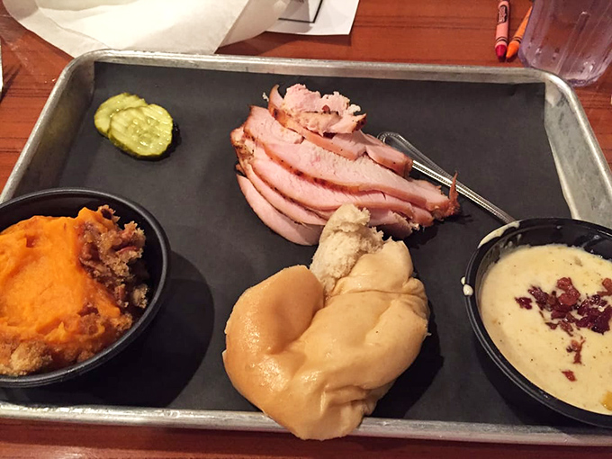 Sliced turkey breast that defies BBQ stereotypes&mdash;juicy and flavorful, served with sweet potato souffl&eacute; and mac & cheese that would make grandma jealous.