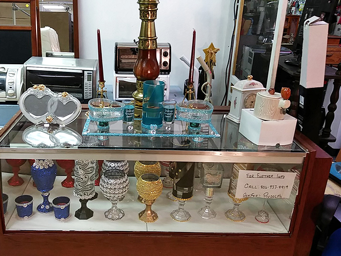 Vintage glassware and collectibles await new homes. One person's "I don't have room for this" becomes another's "perfect for my shelf!"