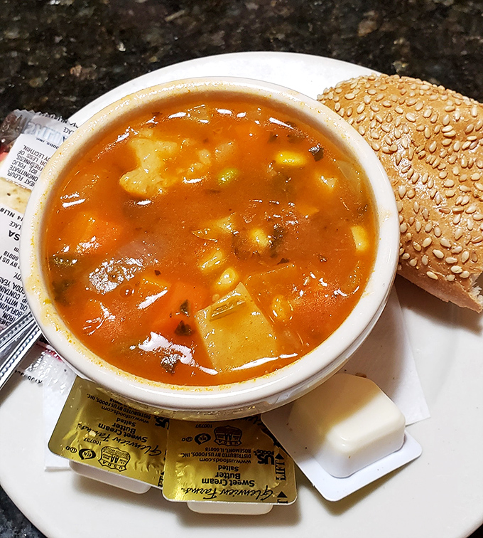 A vegetable soup that actually contains recognizable vegetables&mdash;revolutionary concept! Served with a sesame-studded sidekick for proper dunking.