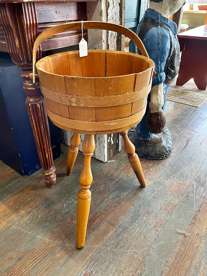Not your average bucket! This wooden firkin on tripod legs has graduated from apple-gathering to conversation-starting. Form and function in perfect harmony.