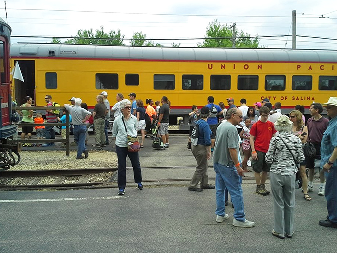 Three generations discovering that screens can't compete with real steam and steel magnificence.