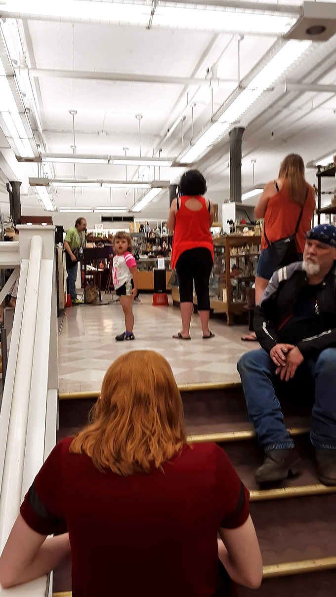 The multi-level layout creates natural discovery zones, with stairs inviting exploration to new floors of finds. Every step creaks with stories of treasure hunters past.