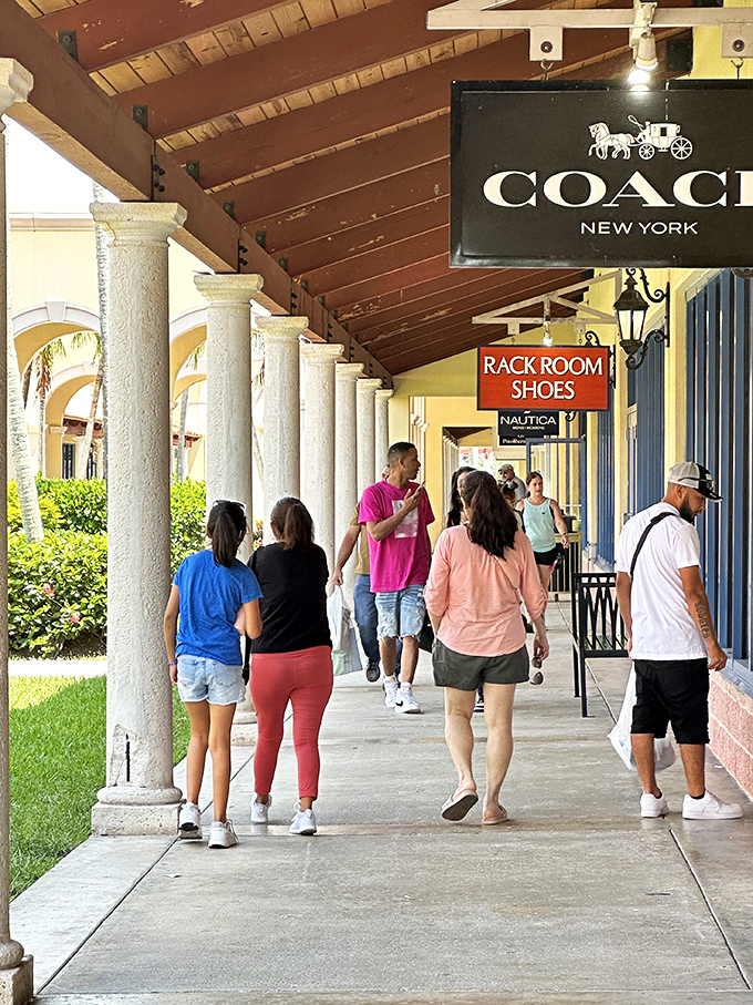 The covered walkways offer shoppers protection from Florida's infamous "liquid sunshine" while browsing between Coach and Rack Room Shoes.