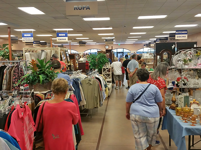 The universal language of bargain hunting brings shoppers together under signs that helpfully guide you in both English and Spanish.