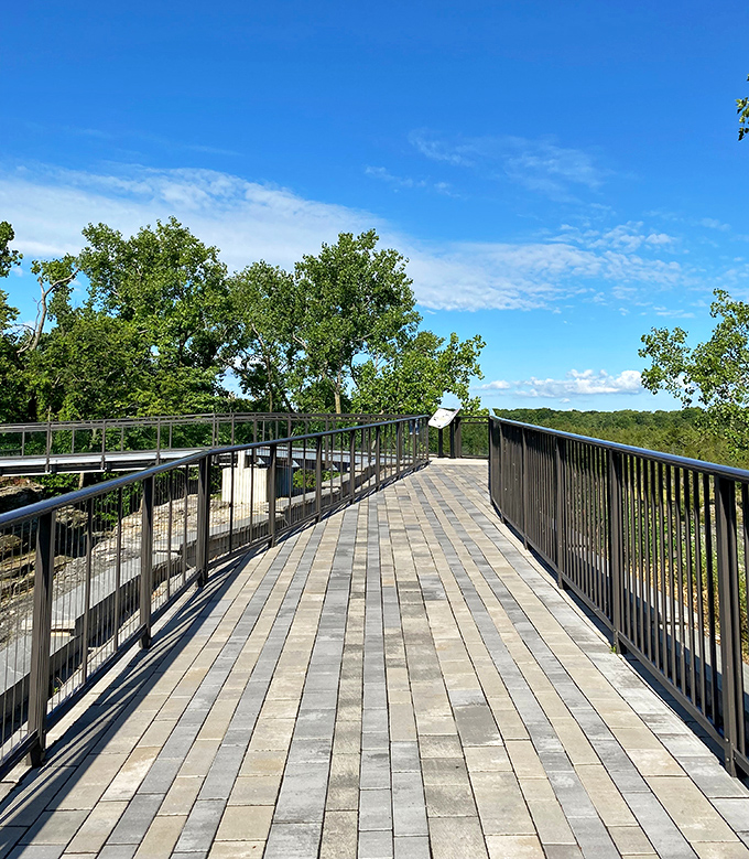 The viewing walkway offers a perfect vantage point, like front-row seats to Earth's greatest geological theater production.