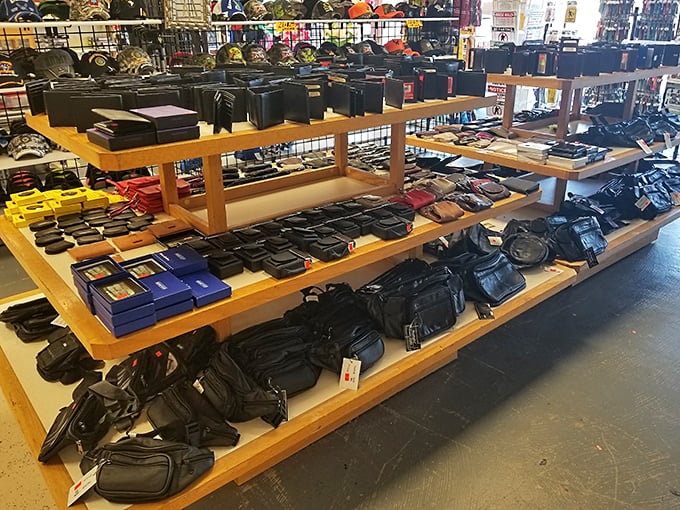 Leather goods galore! This wallet and bag display offers everything from practical pouches to statement pieces that might make your credit cards feel fancy.