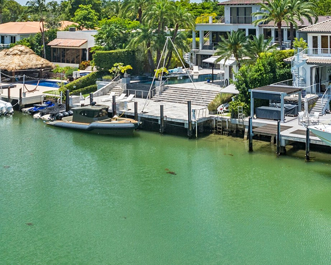 Waterfront living, Key Biscayne style: where your morning commute involves walking from your bedroom to your boat in approximately 37 seconds flat.