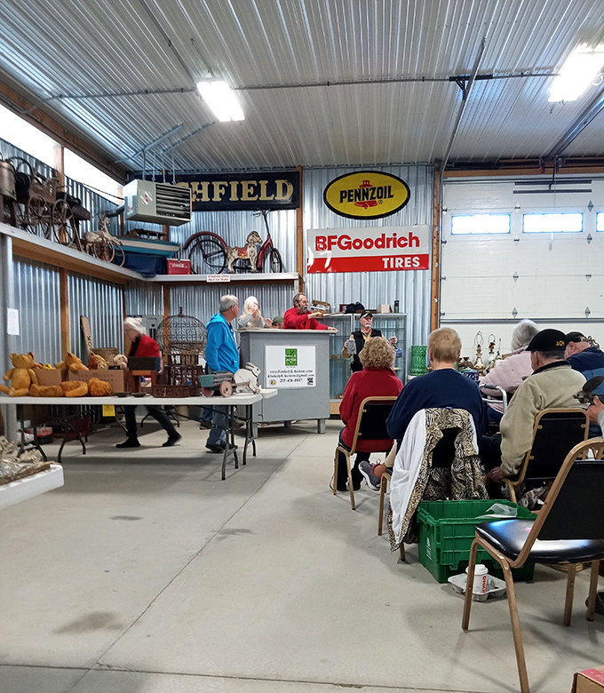 Vintage advertising signs watch over shoppers like guardians of retail history. That Pennzoil sign has witnessed more haggling than a Mediterranean bazaar.