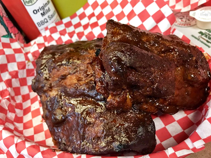 These baby backs have the kind of bark that makes tree bark jealous. The glaze catches light like stained glass in a carnivore's cathedral.