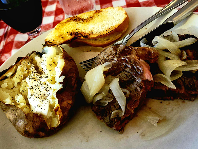 The loaded baked potato isn't just a side dish&mdash;it's the Robin to your steak's Batman, a worthy companion to greatness.