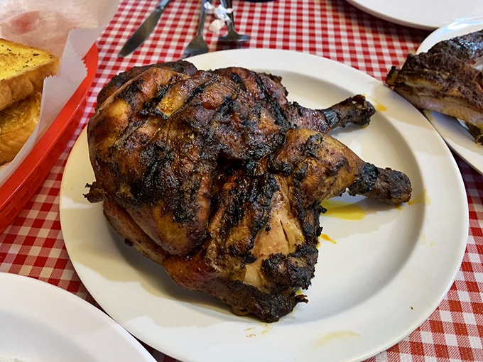 The star of the show! This barbecue chicken with its perfect char and smoky essence is what food dreams—and return trips—are made of.