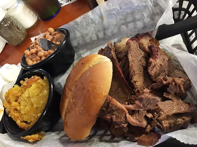 Brisket so tender it practically surrenders at the sight of your fork, paired with cornbread that would make your grandmother secretly jealous.