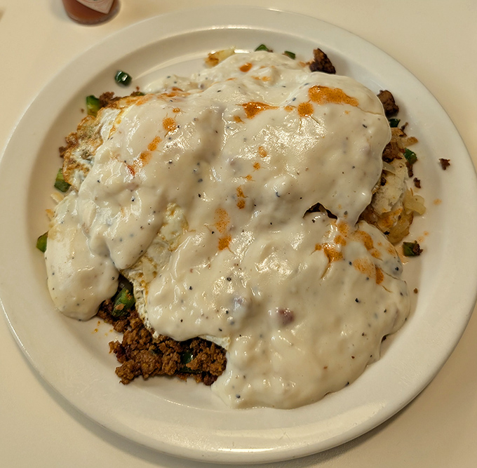 Biscuits and gravy so good they should require a permission slip&mdash;a creamy, peppery blanket covering everything in its path with delicious intent.