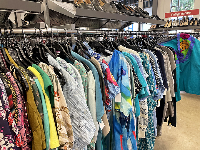 A kaleidoscope of patterns and colors, the blouse section is where 1970s flower power meets 1990s minimalism in a fabric time machine.