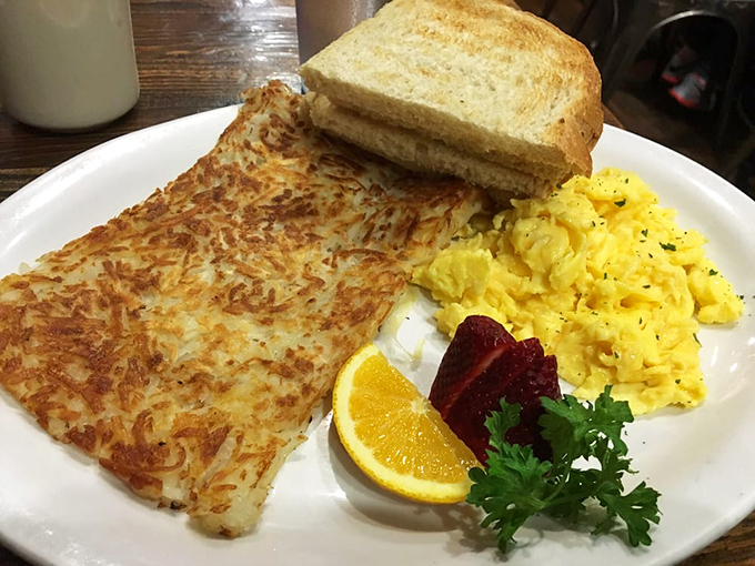 Crispy hash browns that crackle with each bite, fluffy scrambled eggs, and toast standing by for yolk-sopping duty. Breakfast fundamentals executed with precision.